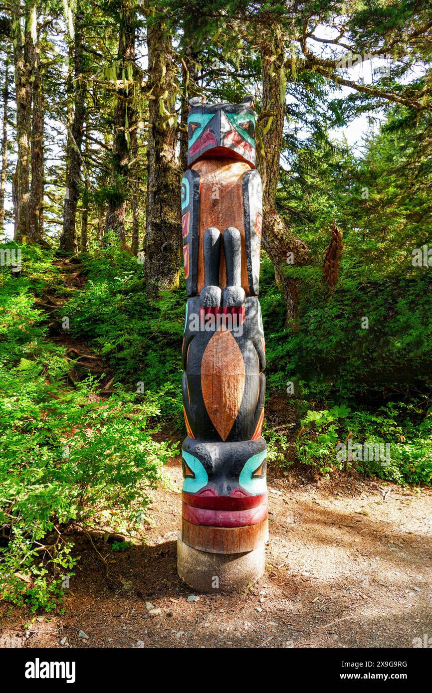 Native American totem pole in a forest on top of Mount Roberts above ...