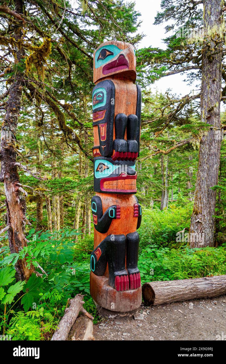 Native American totem pole in a forest on top of Mount Roberts above ...