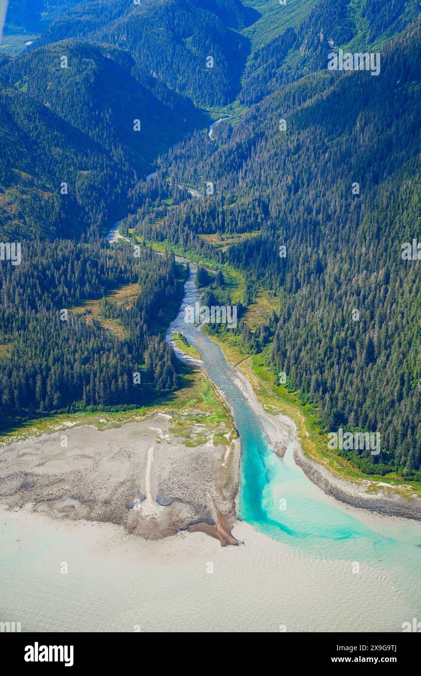 Aerial view of a melt water river delta flowing into the Taku River ...