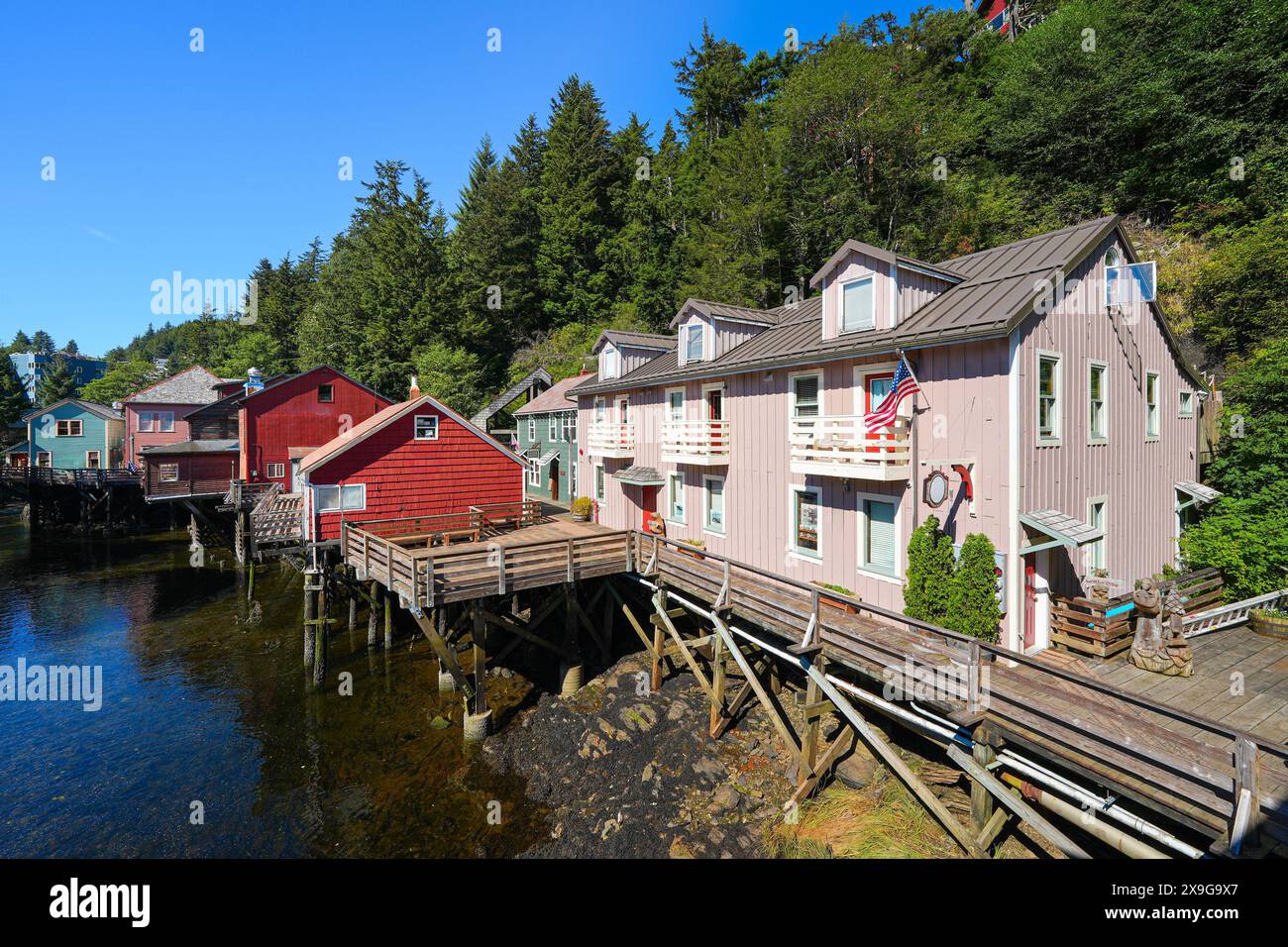 Historic wooden buildings of Creek Street in Ketchikan, built on a ...
