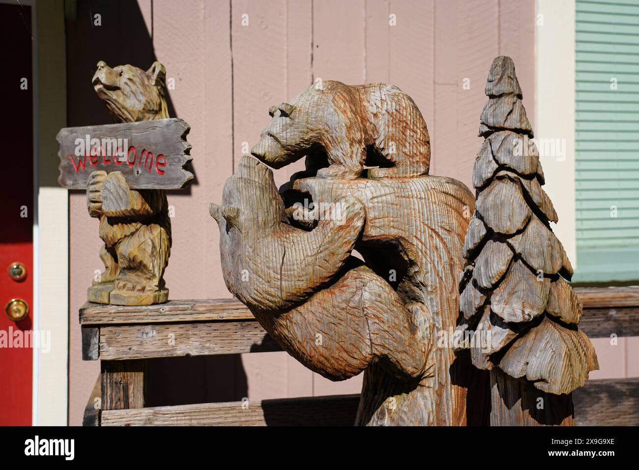 Wooden bear statue in Creek Street, Ketchikan, a popular tourist area ...