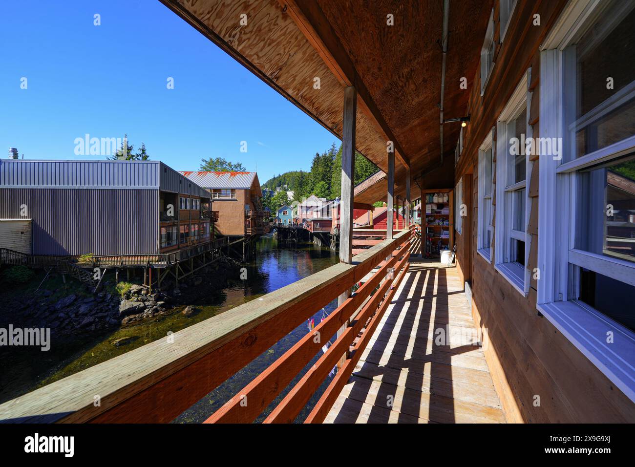 Historic wooden buildings of Creek Street in Ketchikan, built on a ...