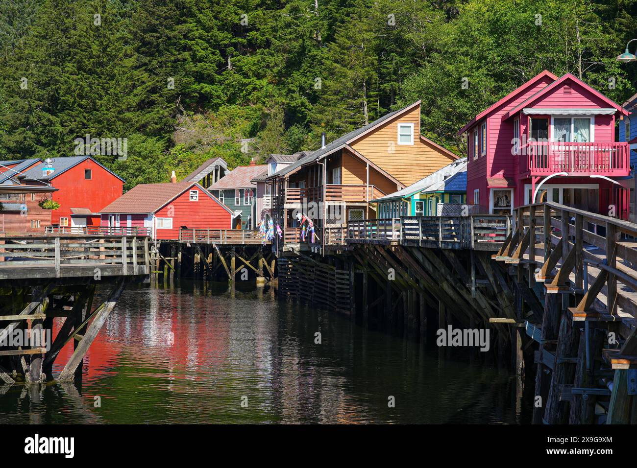 Historic wooden buildings of Creek Street in Ketchikan, built on a ...