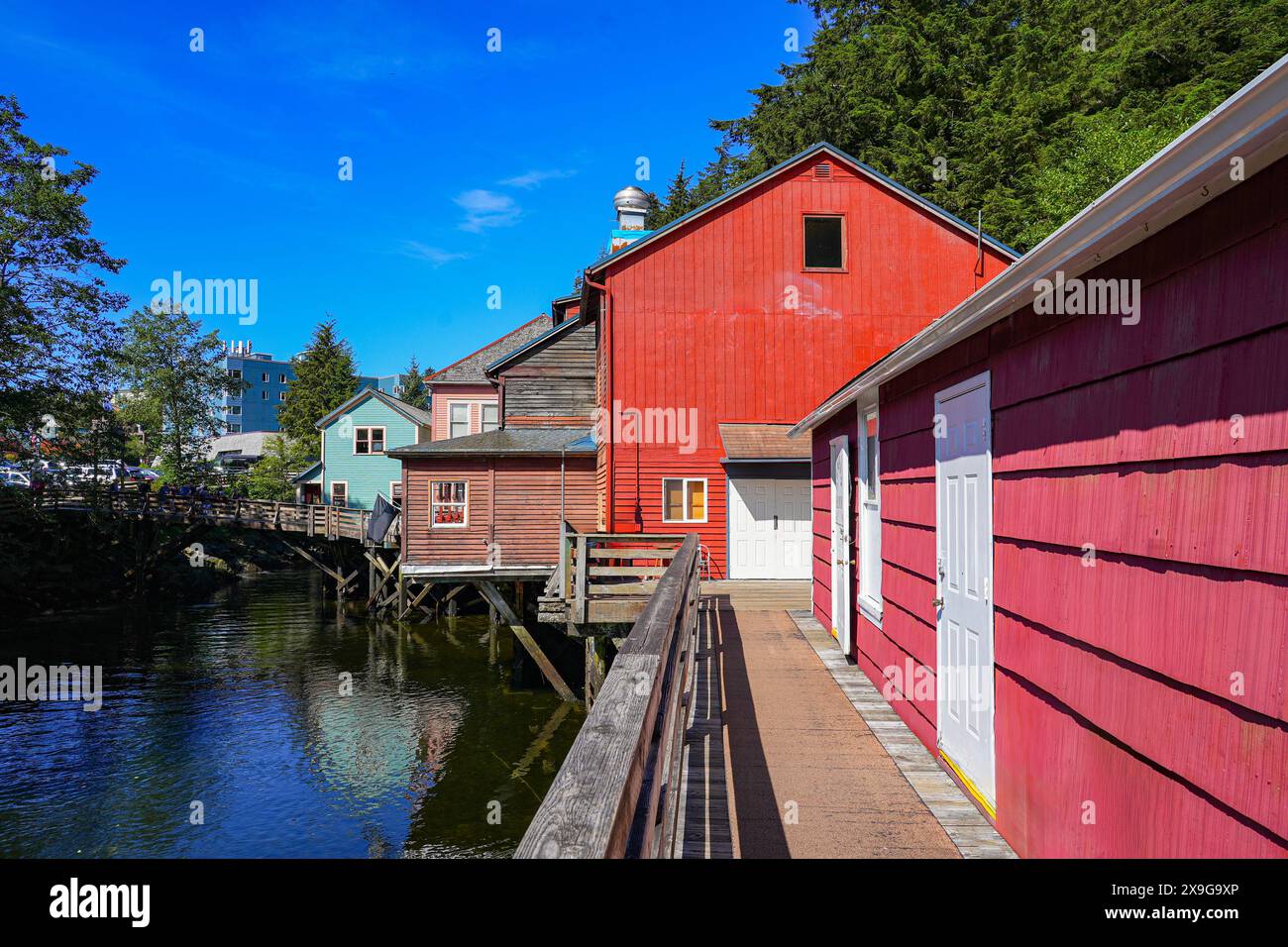 Historic wooden buildings of Creek Street in Ketchikan, built on a ...