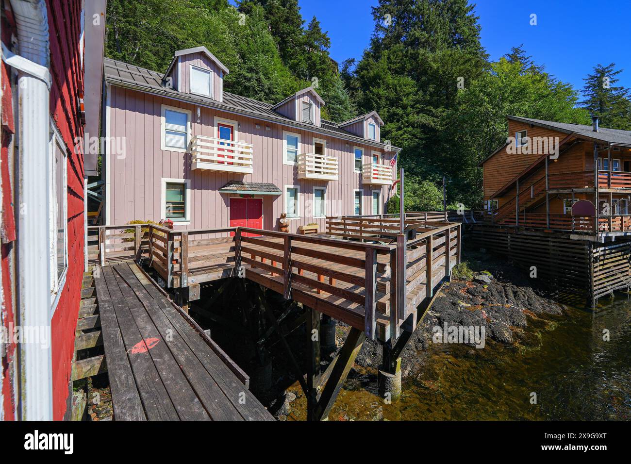 Historic wooden buildings of Creek Street in Ketchikan, built on a ...