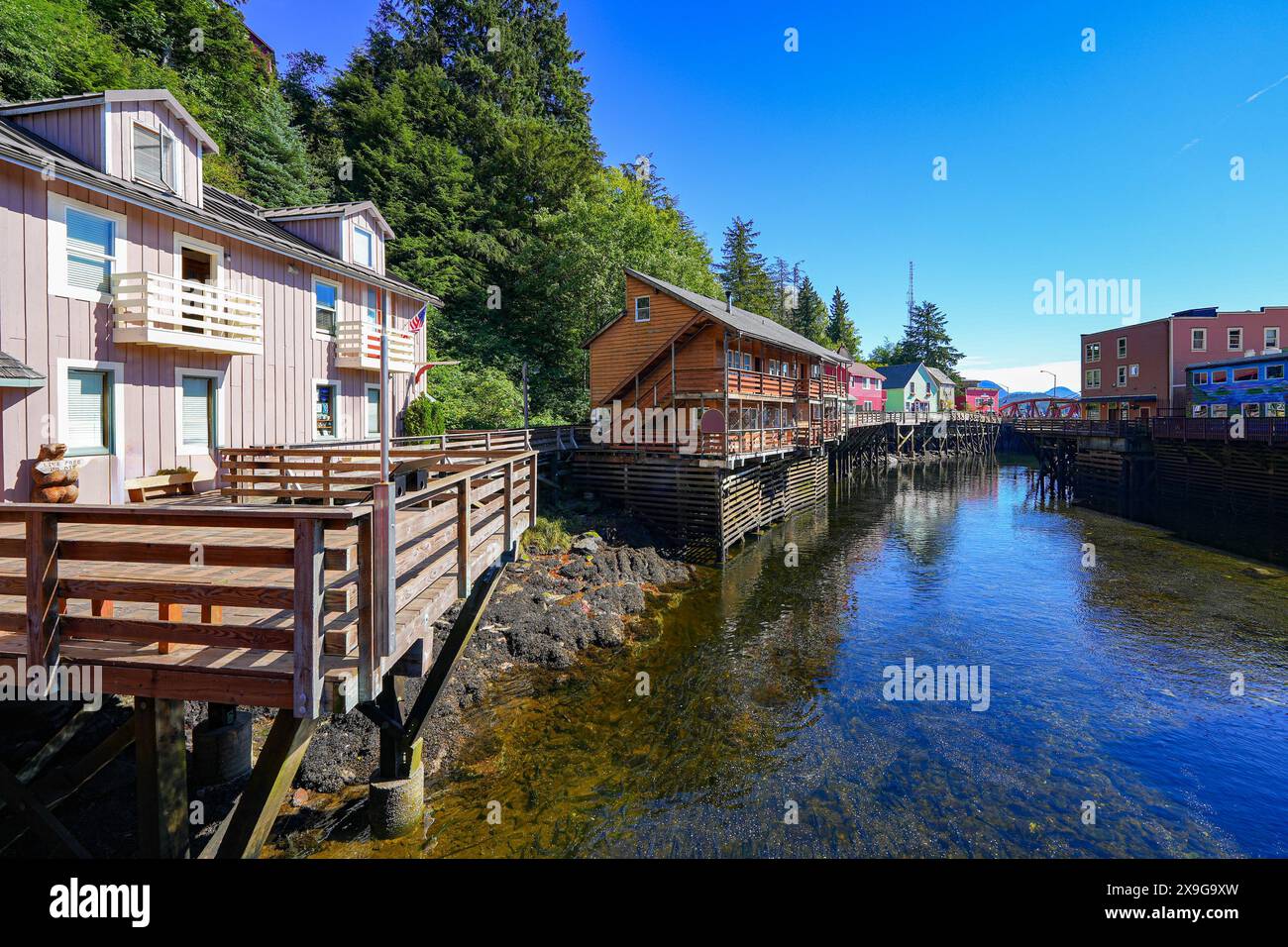 Historic wooden buildings of Creek Street in Ketchikan, built on a ...