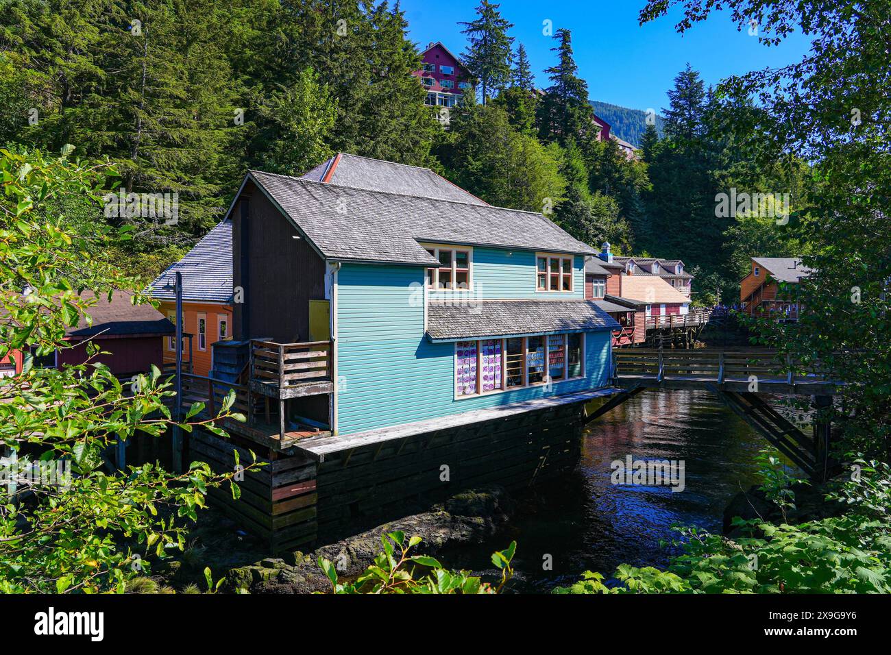 Historic wooden buildings of Creek Street in Ketchikan, built on a ...