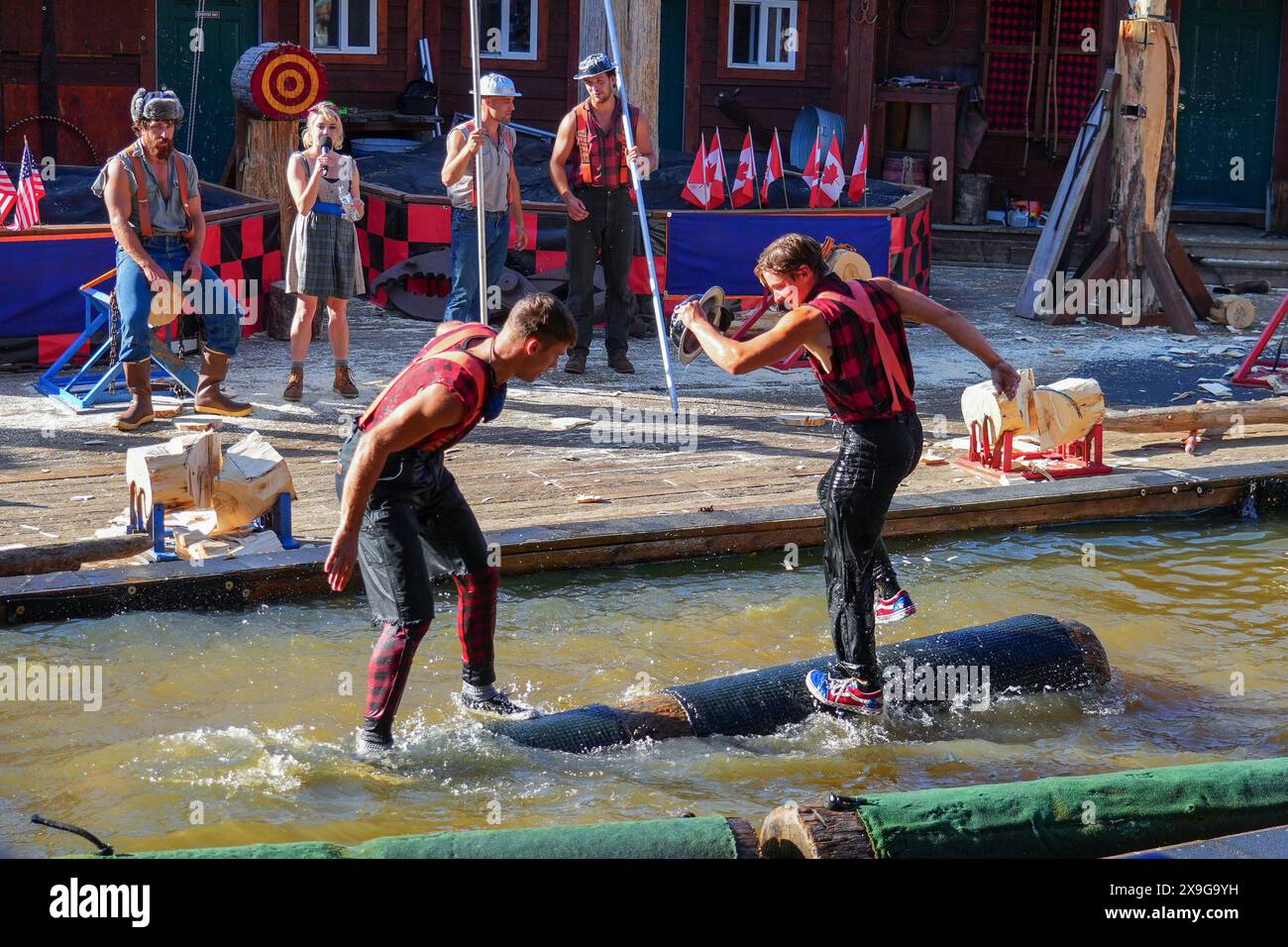 Lumberjacks participating in log rolling games at the Great Alaskan ...