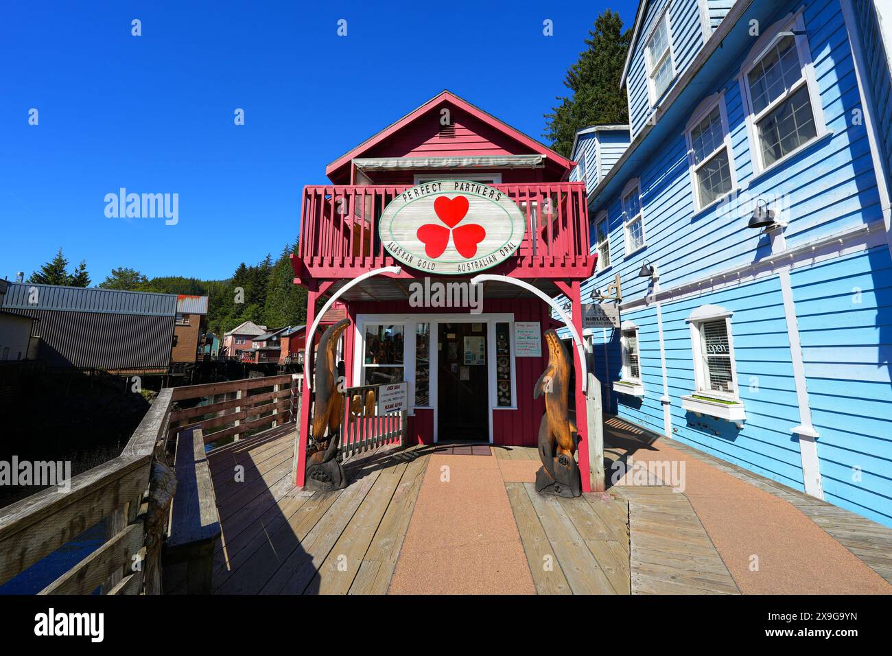 Historic wooden buildings of Creek Street in Ketchikan, built on a ...