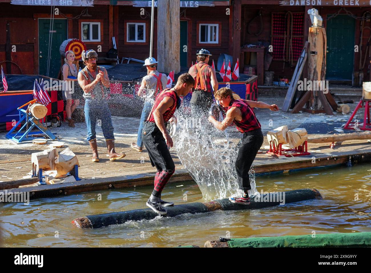 Lumberjacks participating in log rolling games at the Great Alaskan ...