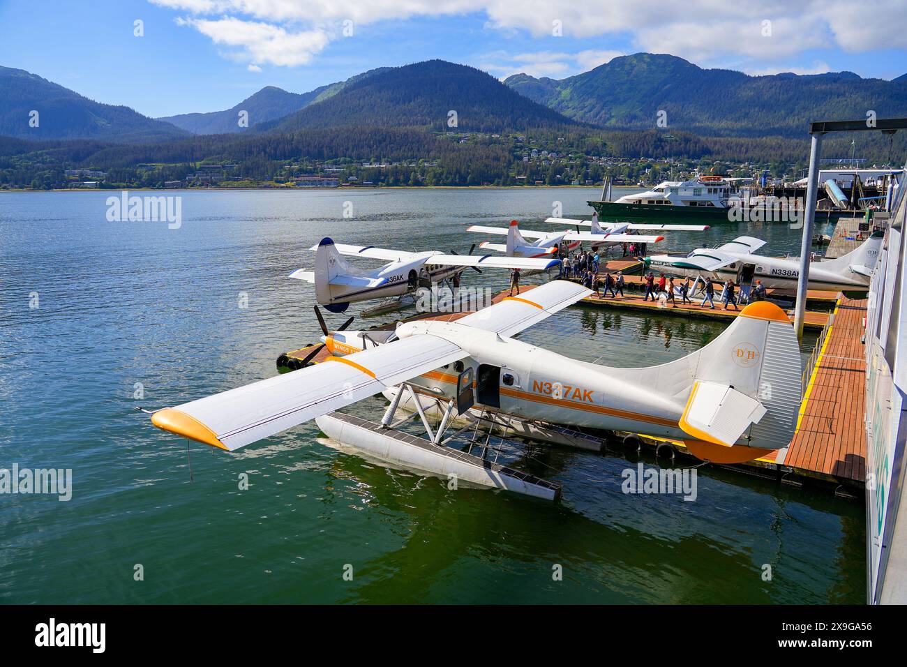 Seaplane moored in the waters of the Gastineau Channel in downtown ...