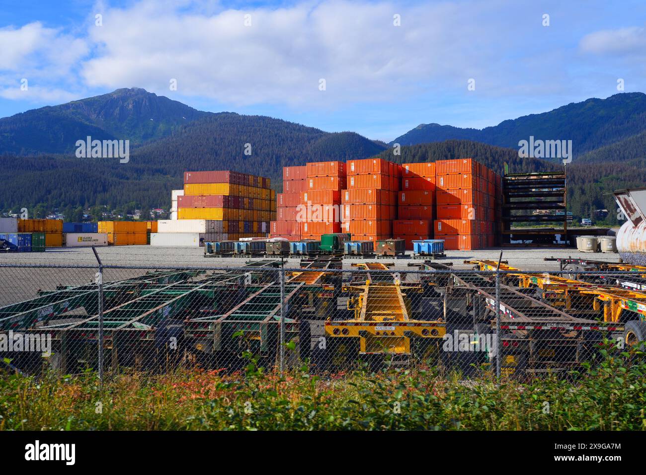 Shipping containers piled in the commercial harbor of Juneau, the ...