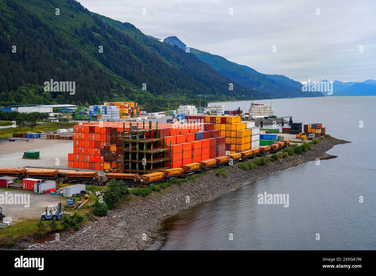 Shipping containers piled in the commercial harbor of Juneau, the ...