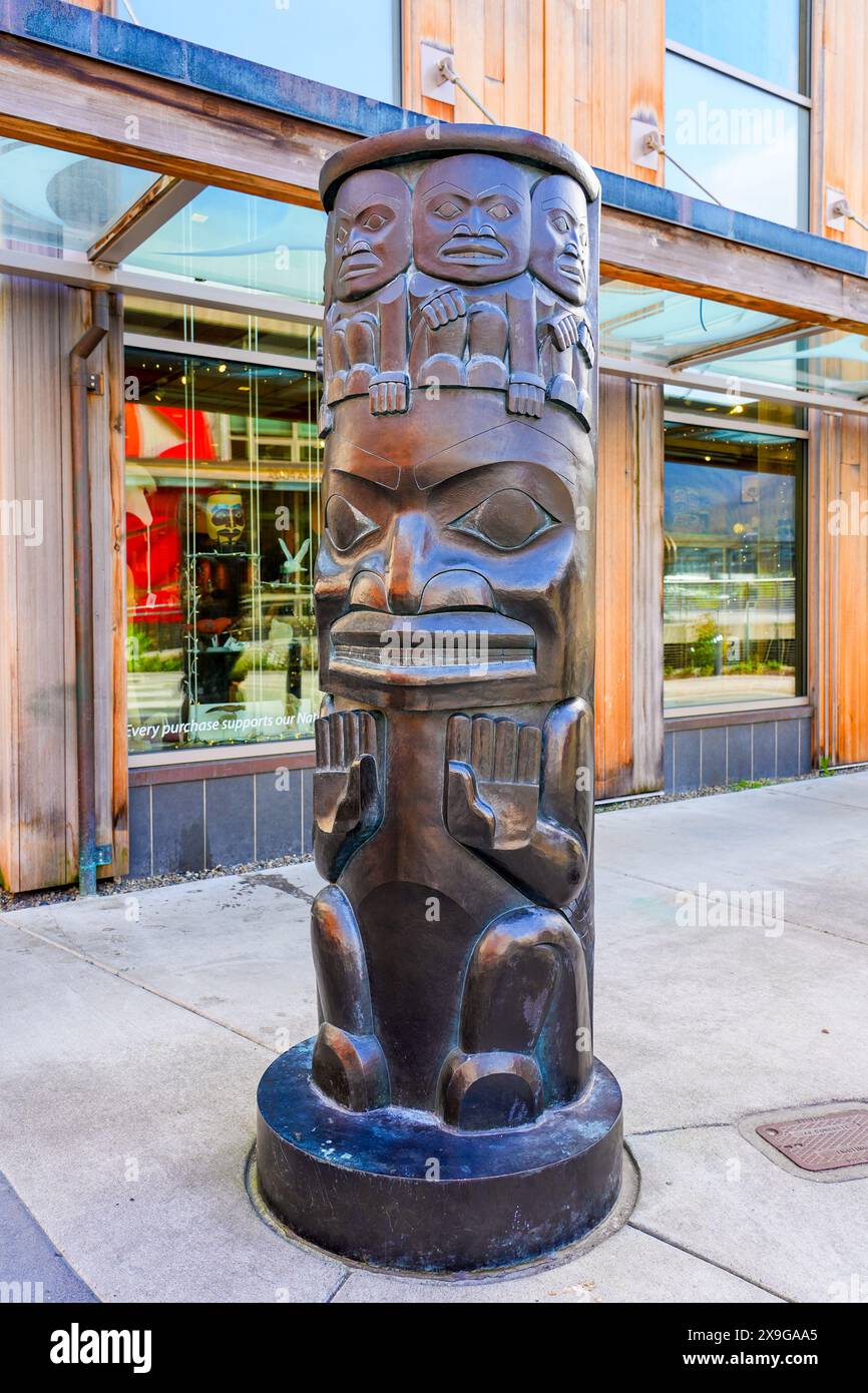 Native American totem pole on Sealaska Plaza in Juneau, capital city of ...