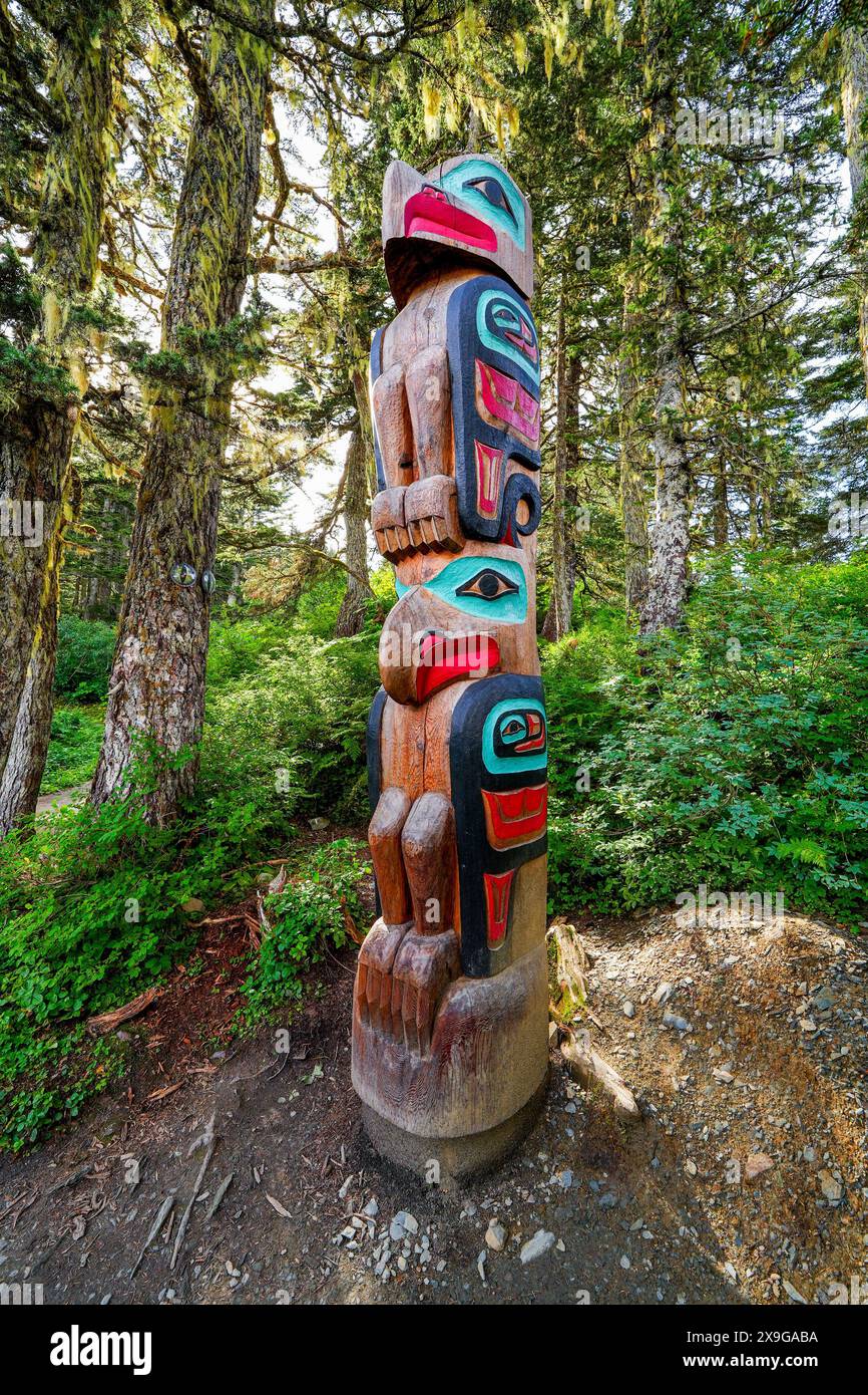 Native American totem pole in a forest on top of Mount Roberts above ...