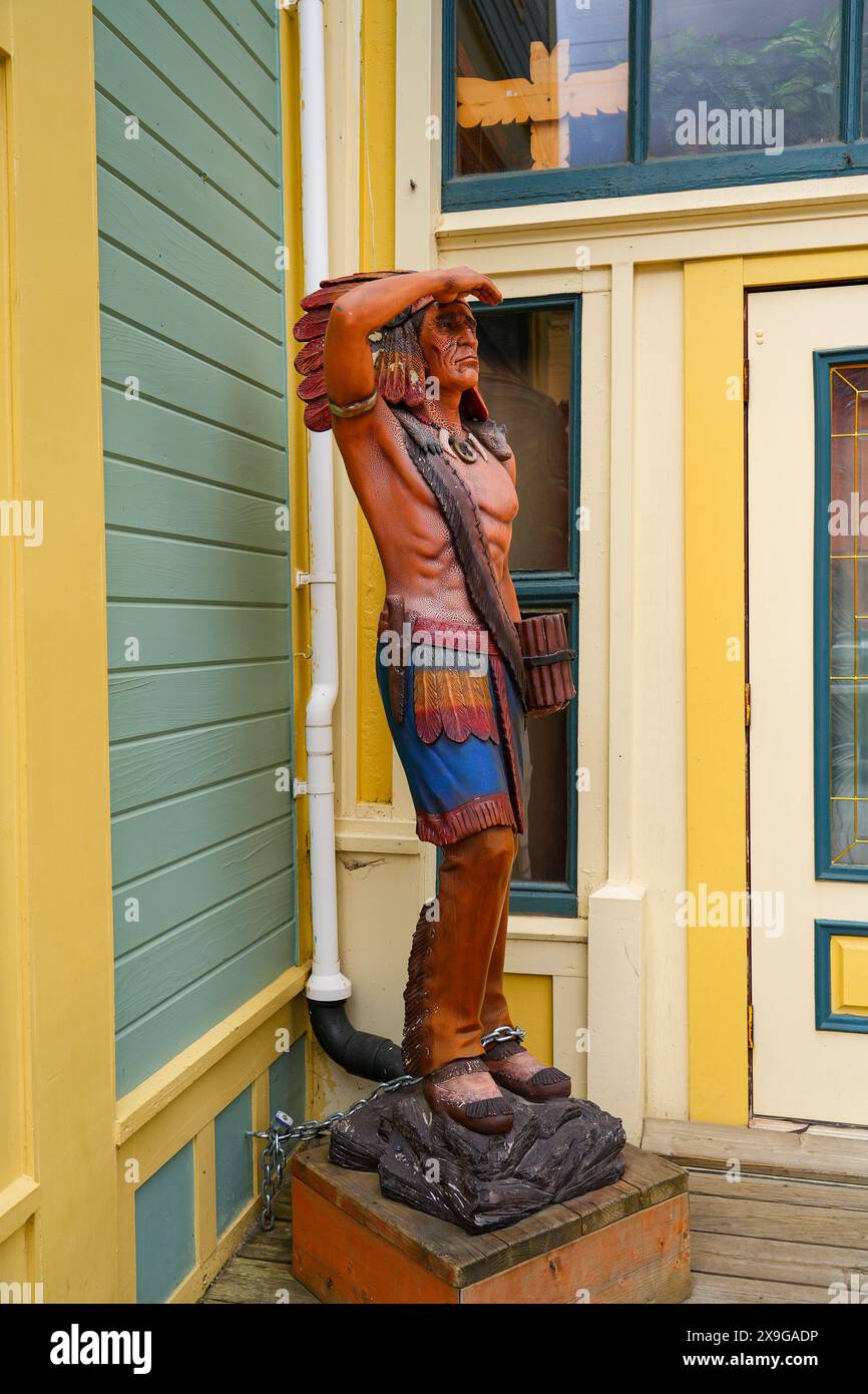 Statue of a native chief in the old city center of Skagway, Alaska ...