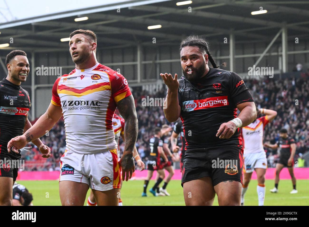 Konrad Hurrell of St. Helens celebrates his try by blowing a kiss to ...