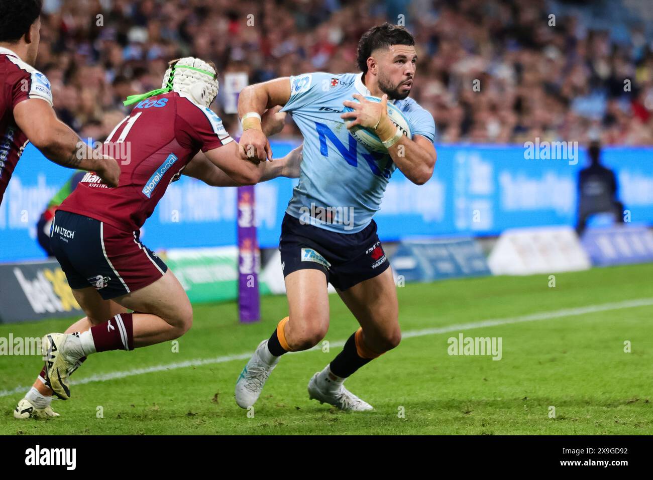 Sydney, Australia, 31 May, 2024. Tristan Reilly of the Waratahs runs ...