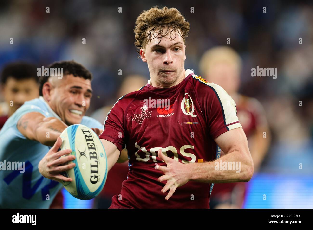 Sydney, Australia, 31 May, 2024. Tim Ryan of Queensland Reds runs the ...