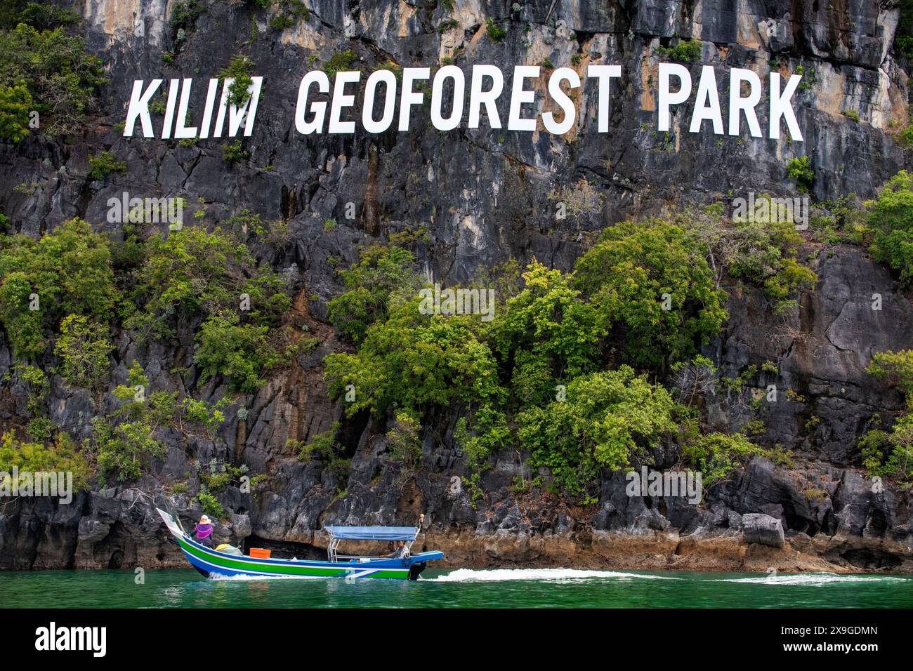 Boat trip at the Kilim Geoforest Park Jetty. Tourist boat starts their ...