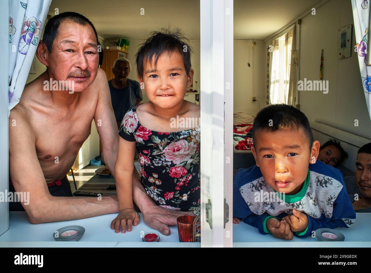 Local people inuit inhabitants in Tasiilaq, also known as Ammassalik ...