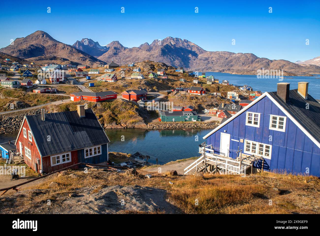 Colorfull houses in Tasiilaq, also known as Ammassalik, East Greenland ...