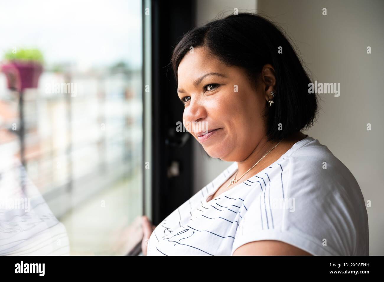 Indoor portrait of a 39 yo hispanic woman, Jette, Brussels, Belgium ...