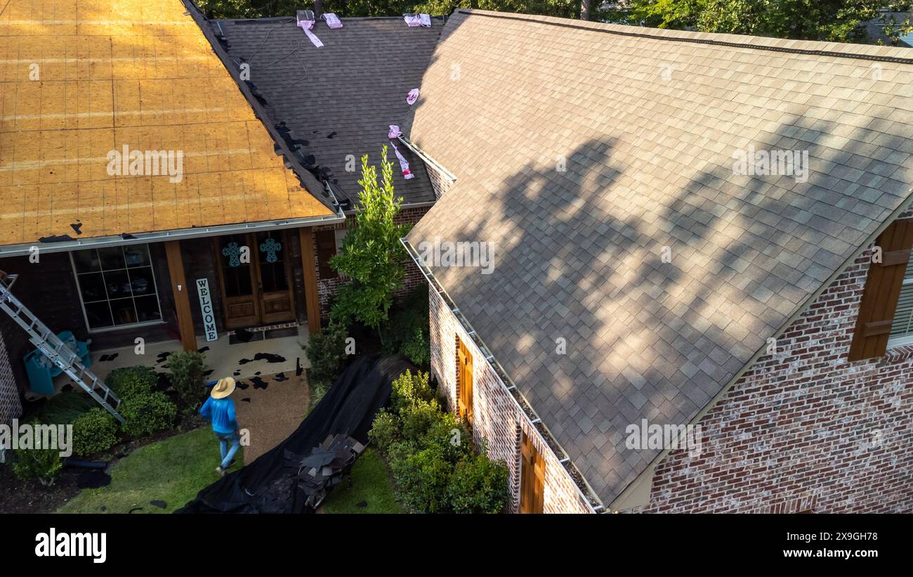House with new roof being installed after hail damage Stock Photo - Alamy