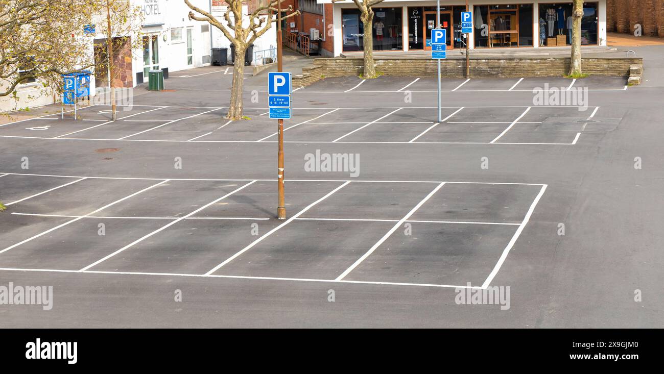 Empty car parking lot in the city. Bornholm, Denmark - May 15, 2024 ...