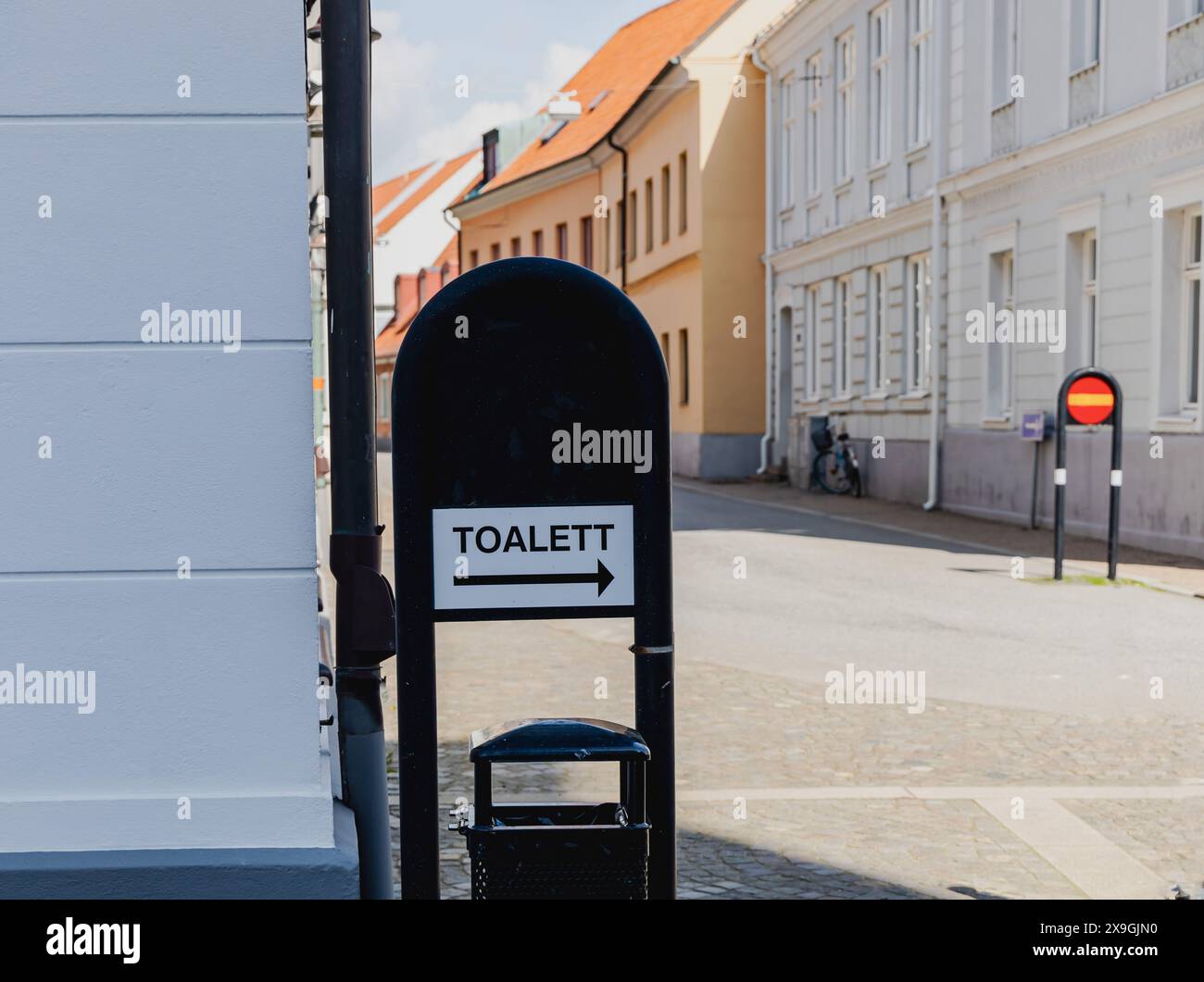Sign in the city with the inscription in Swedish - toilet. High quality ...