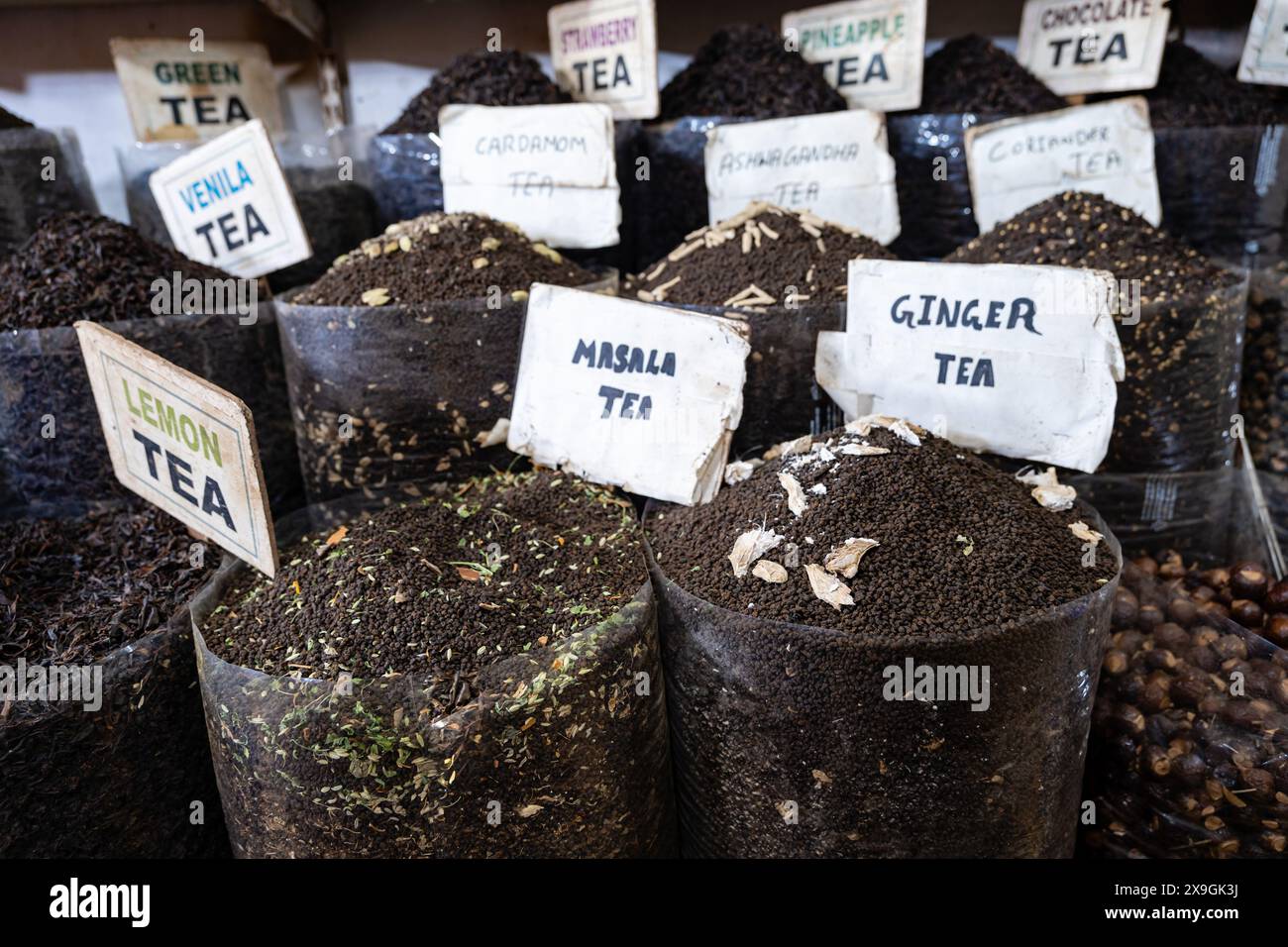 Explore the aromatic world of tea! This vibrant market display ...