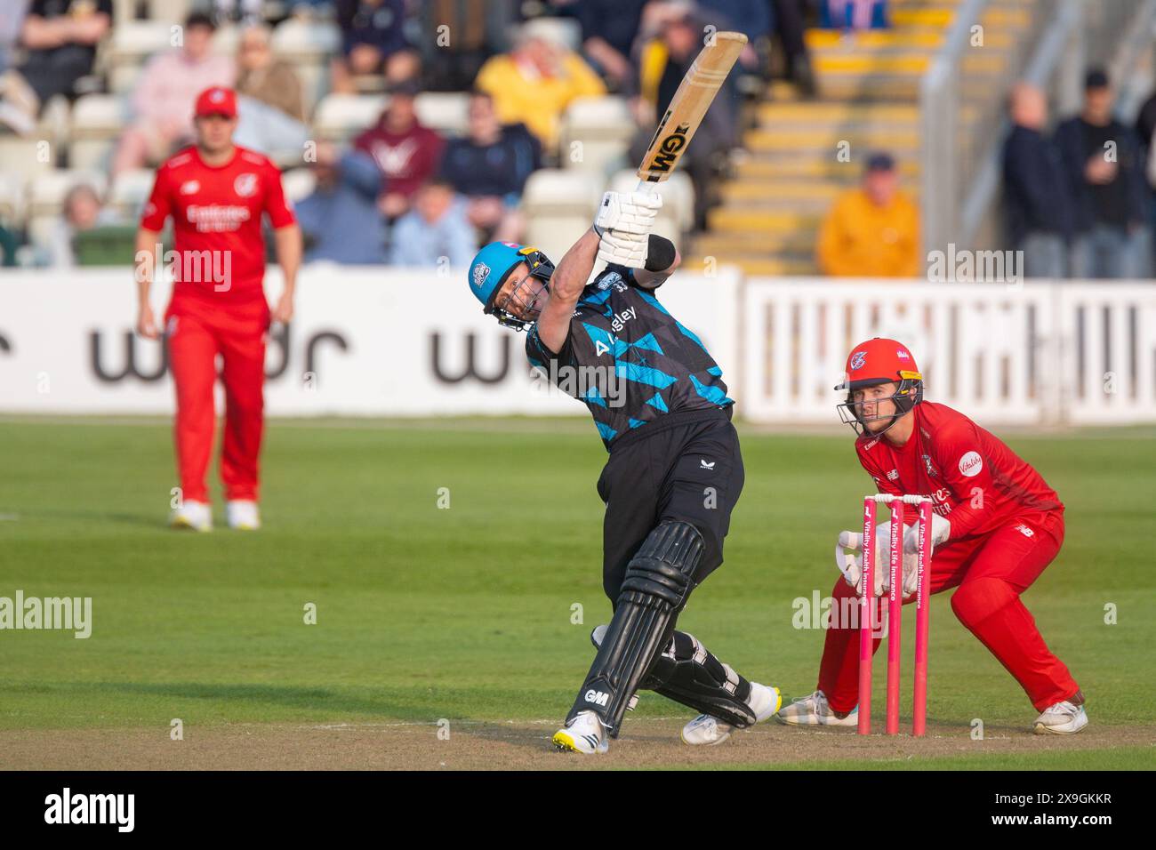 Adam Hose hits it over the boundary for 6 taken in Worcester, UK during ...