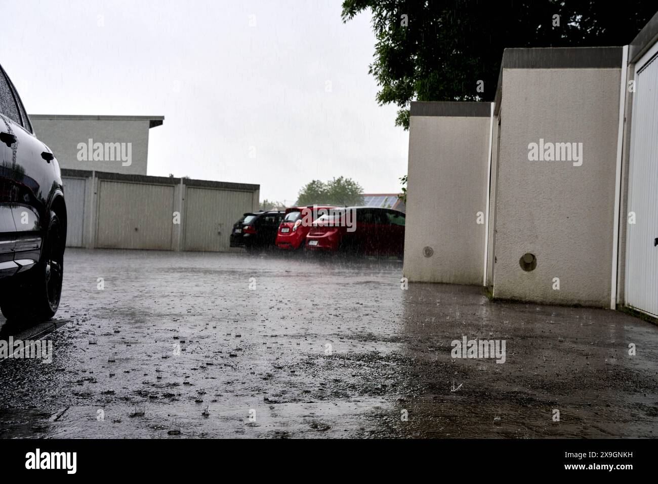 Langweid, Bavaria, Germany - 31 May 2024: Heavy rain or continuous rain ...