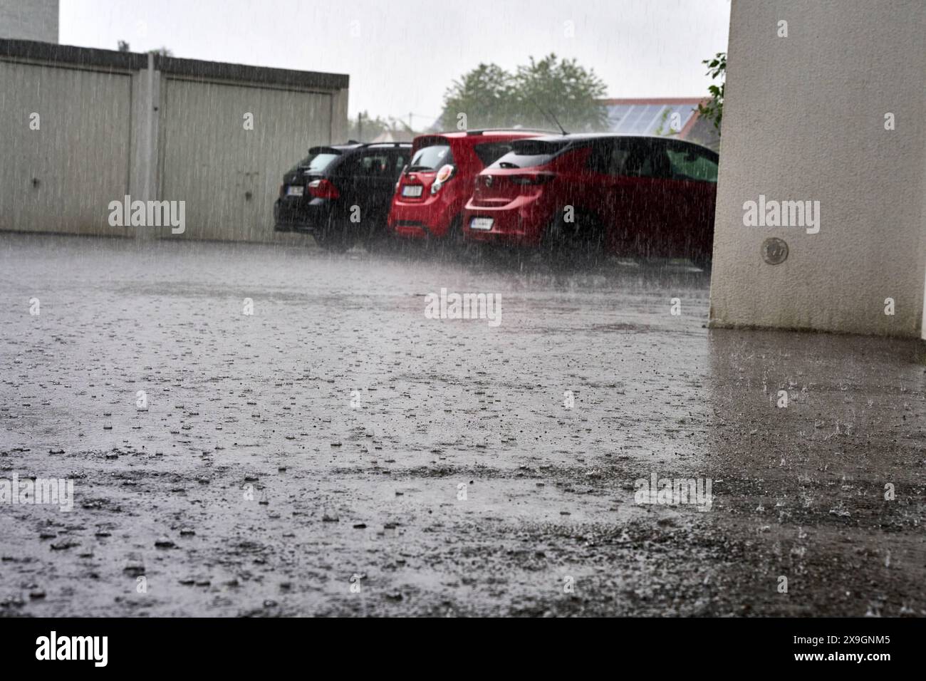 Langweid, Bavaria, Germany - 31 May 2024: Heavy rain or continuous rain ...