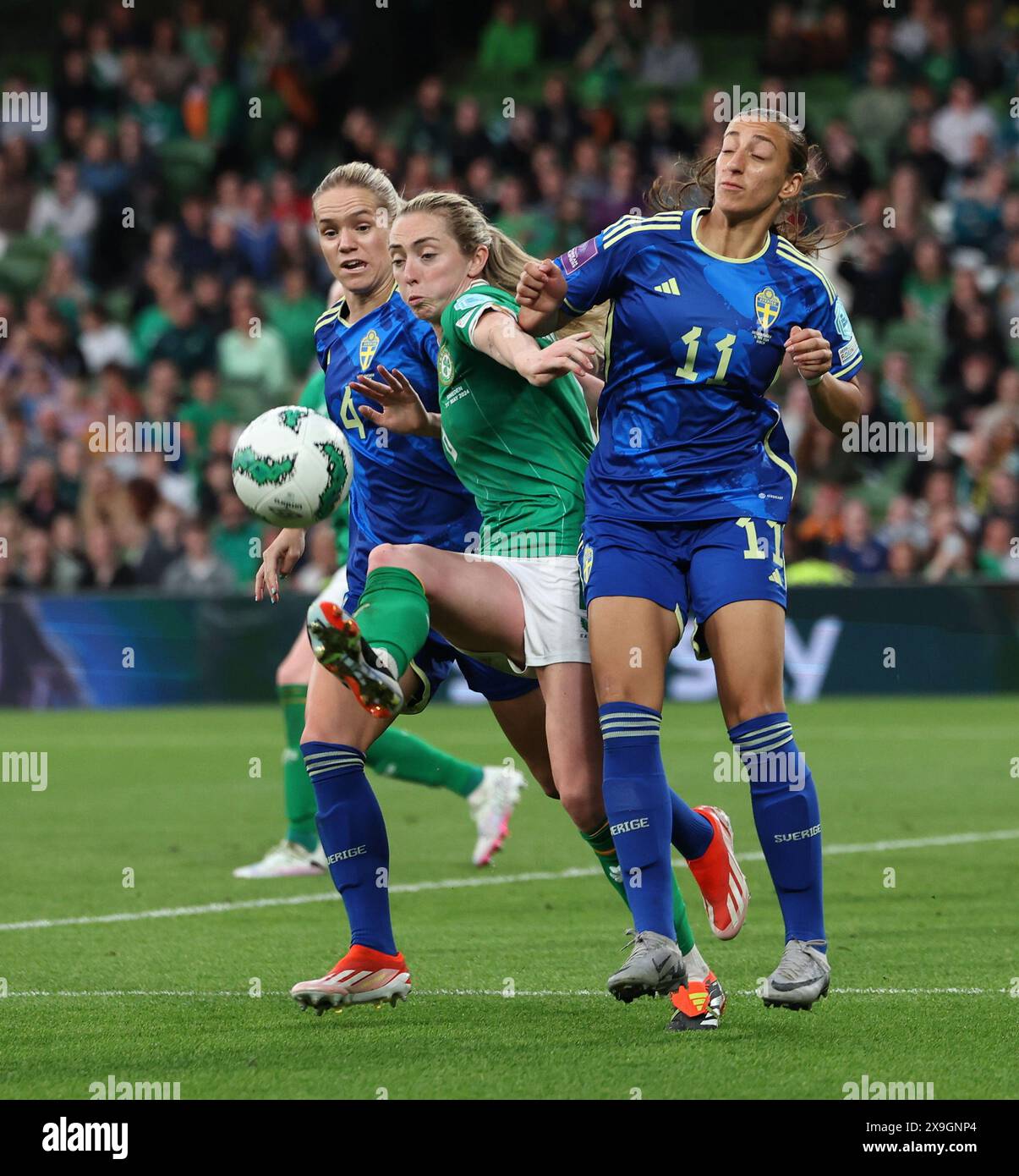 Republic of Ireland's Megan Connolly is tackled by Sweden's Rosa Kafaji ...