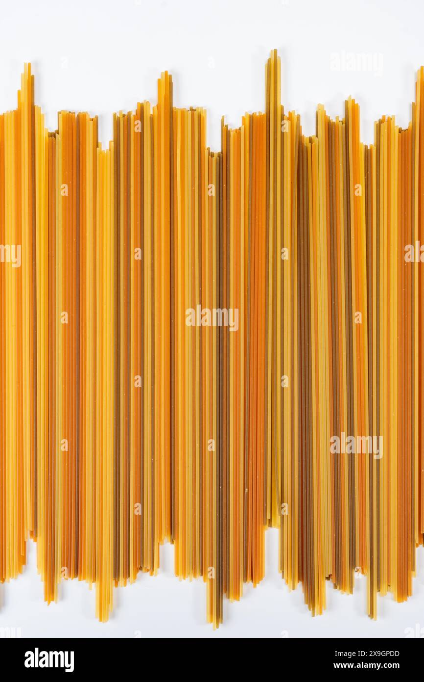 Food background, colorul dried pasta spaghetti, paralleled lines ...