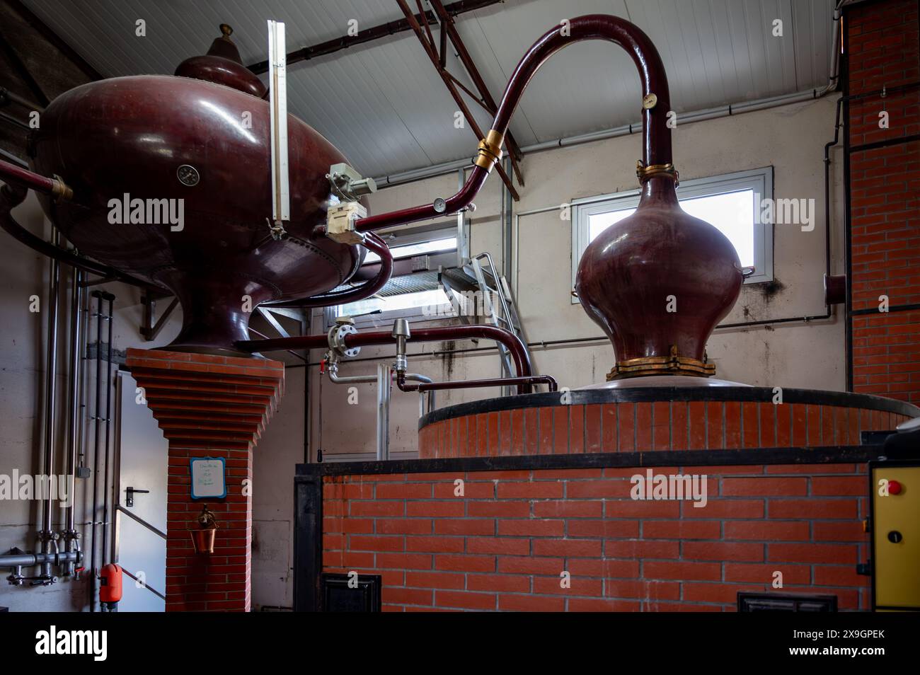Double distillation process of cognac spirits in Charentias copper ...