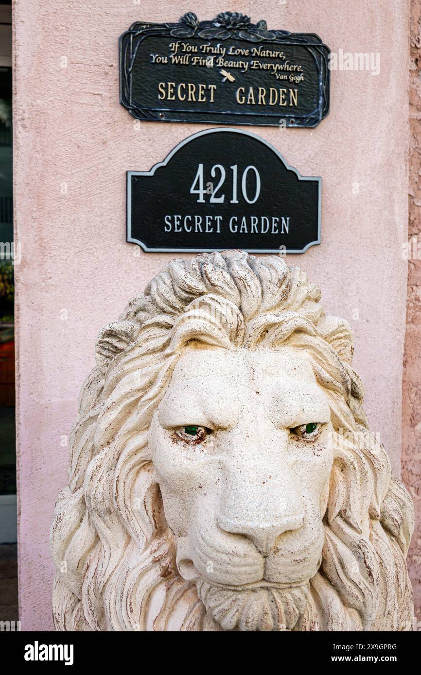 Miami Beach Florida,Secret Garden hotel entrance,sign lion's head ...
