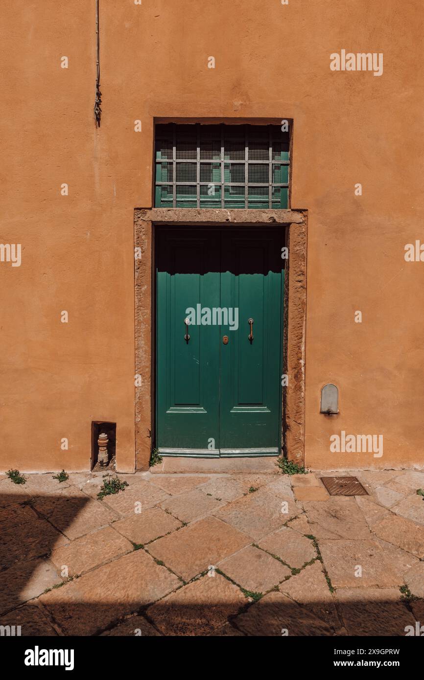 A classic street scene in an Italian Town in Tuscany, Italy on a sunny ...