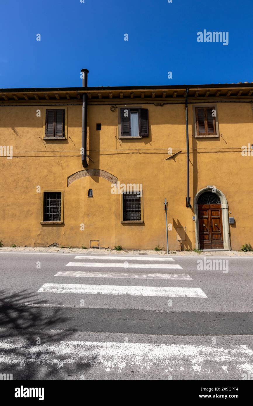 A classic street scene in an Italian Town in Tuscany, Italy on a sunny ...