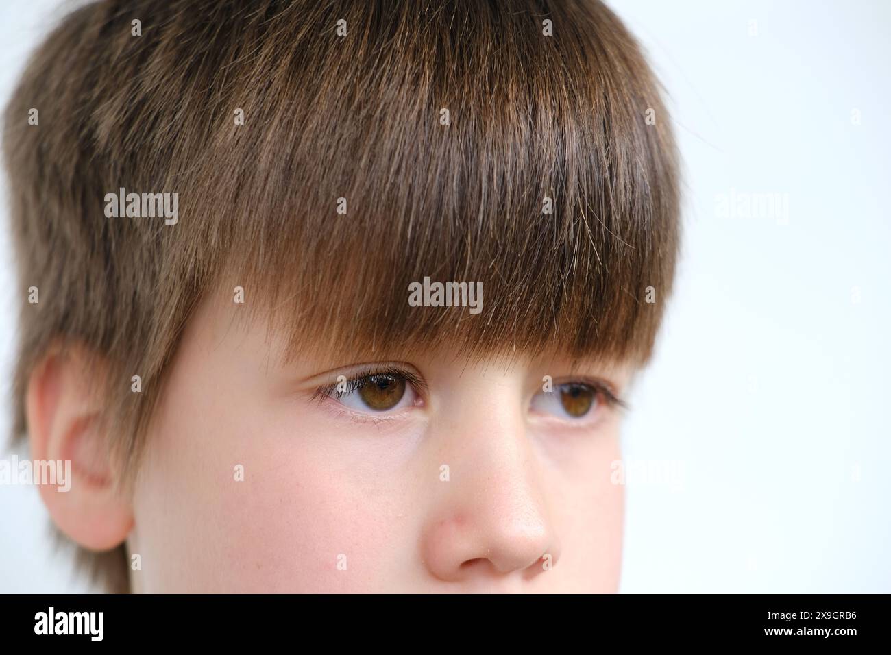 close up part child face, boy 8 years old, human eye looking to side ...