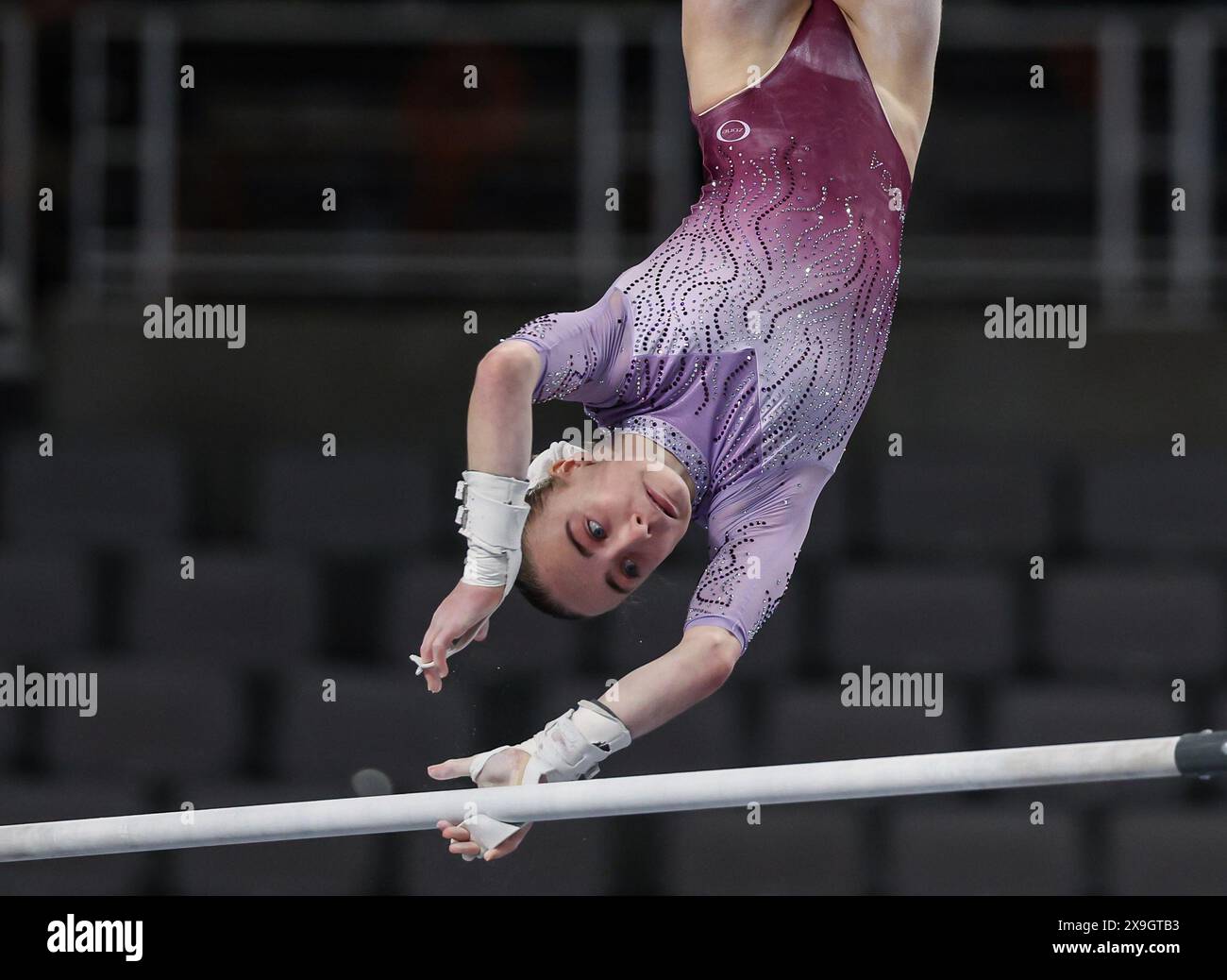 May 31, 2024: Claire Pease of WOGA competes on the uneven parallel bars ...