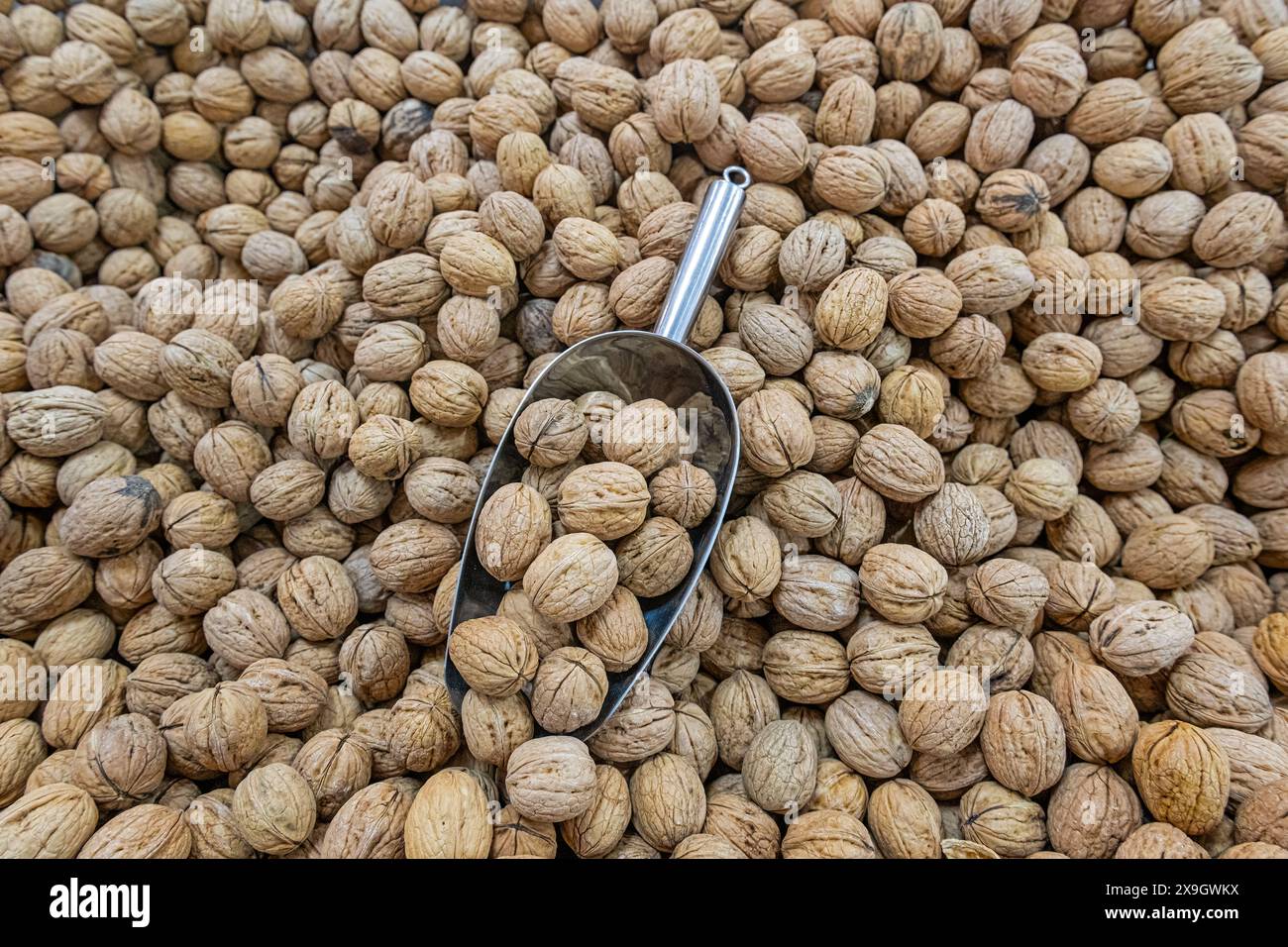 Walnuts sold at the market stall Stock Photo - Alamy