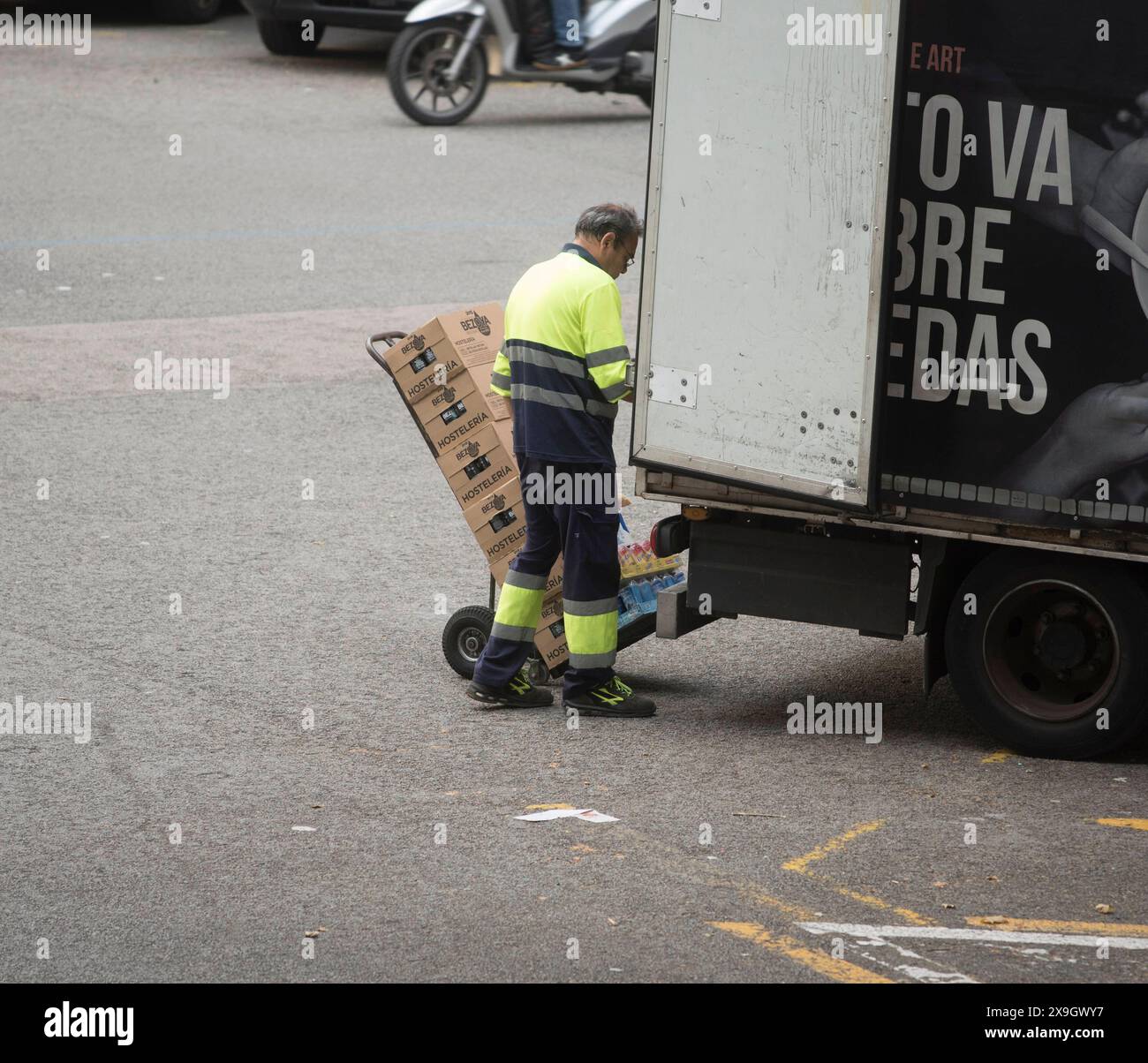 a handcart or trolley for transporting goods and other things a ...