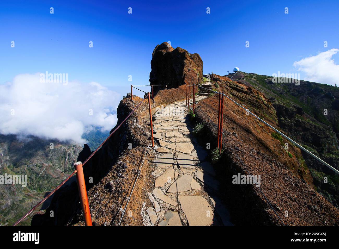 Walking trail at the Pico do Arieiro mountain peak on Madeira island ...