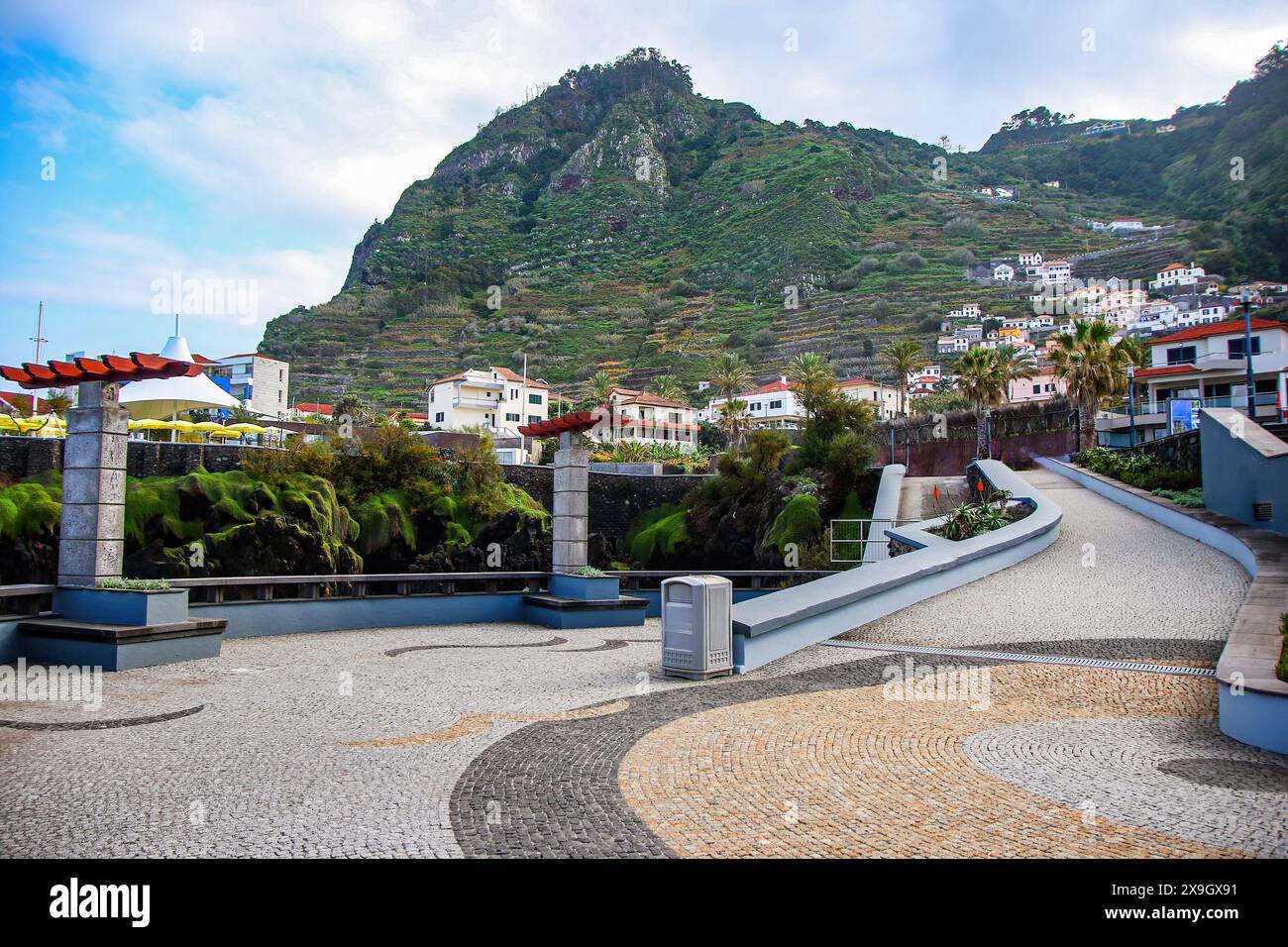 Paved waterfront of View of Porto Moniz on the north coast of Madeira ...
