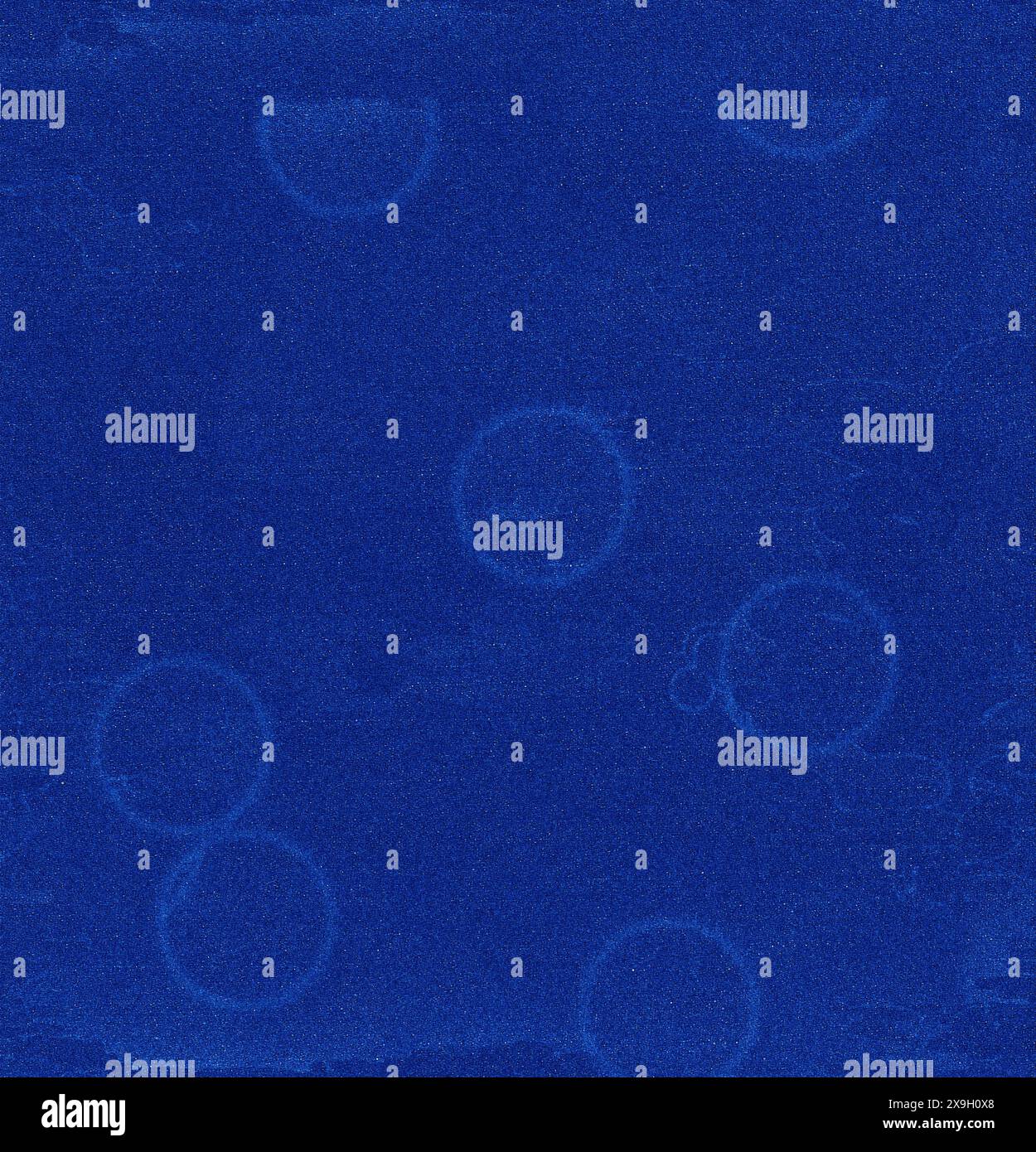 Abstract blue background featuring subtle circle patterns and a ...