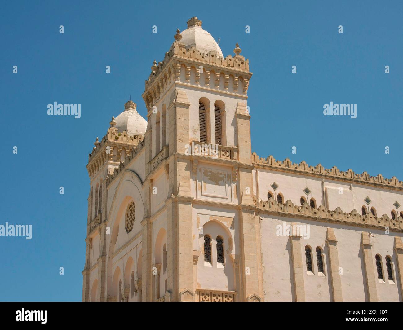 Historic church with impressive architecture and domes under a clear ...