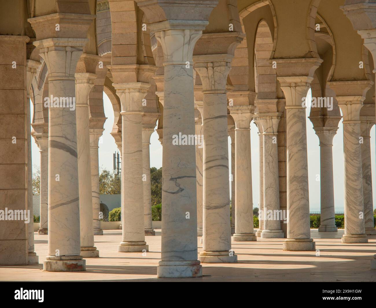 White columns and arches in historic Mediterranean architecture in the ...