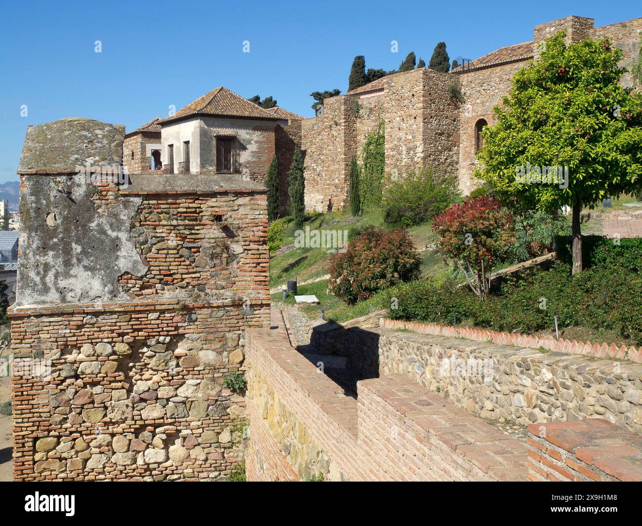 View of historic buildings and brick walls in sunny weather, The city ...